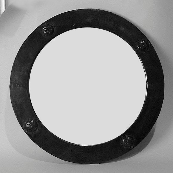 Bonhams : A Liberty & Co pewter wall mirror, ivorine label to the ...