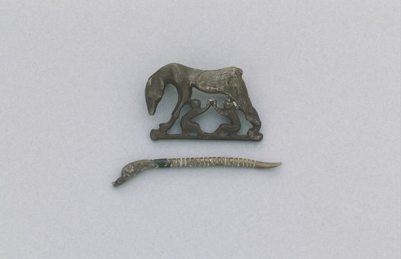 Bonhams : A Roman silver fibula of Romulus and Remus and a Roman pin ...