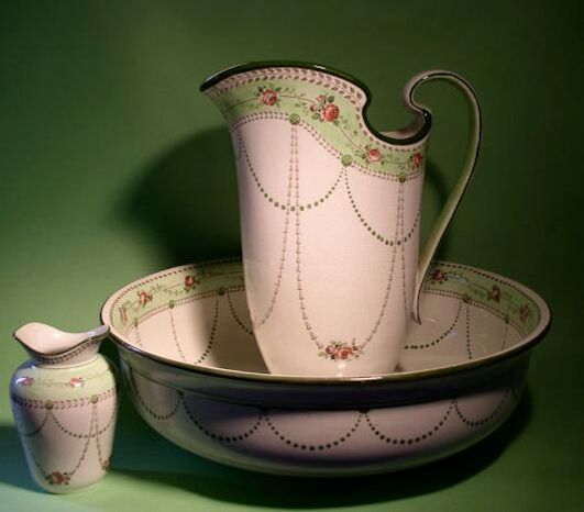Bonhams : A Royal Doulton 'Rosalie' toilet set,