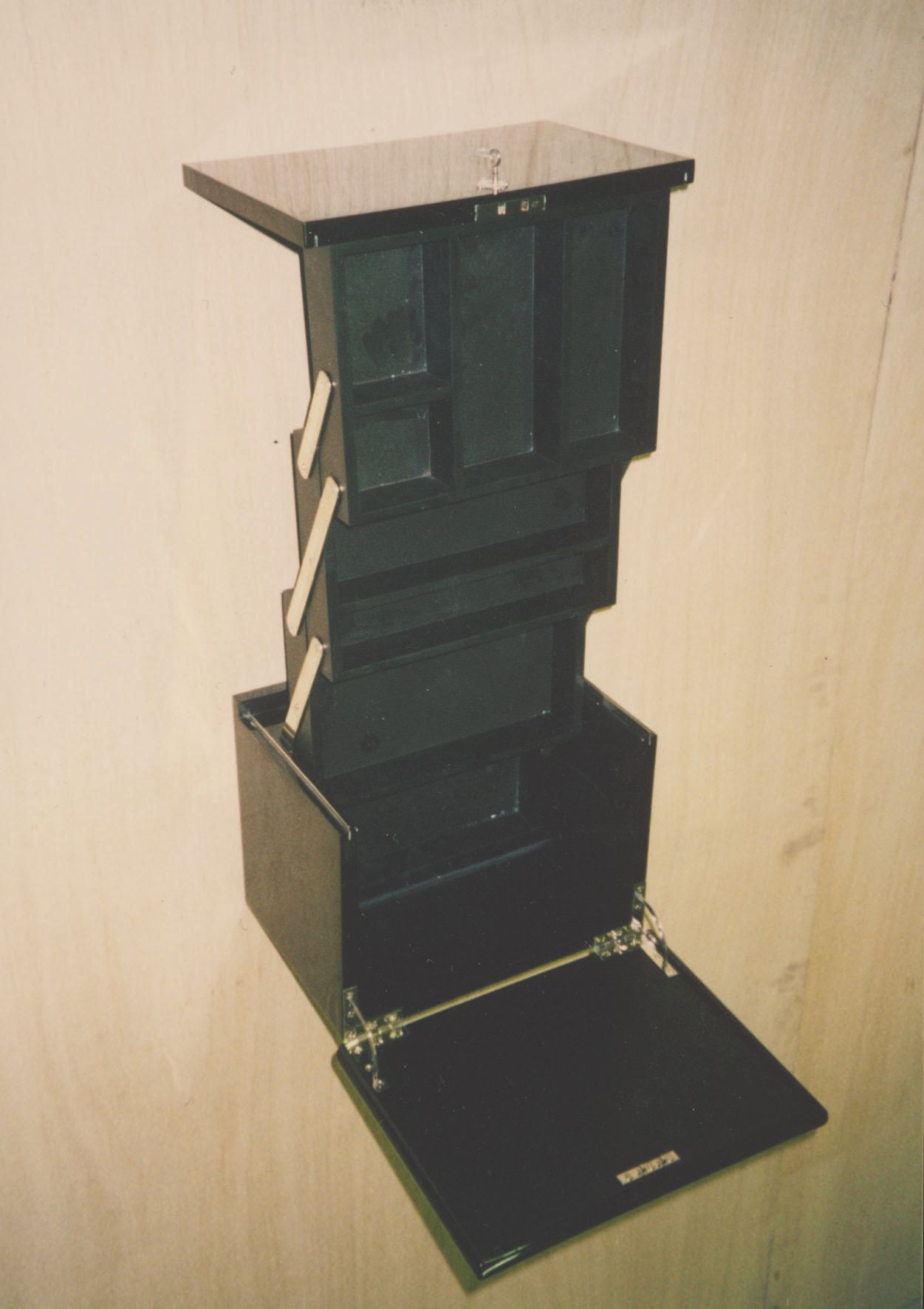 Bonhams Cars : A cantilever running-board mounted tool box,