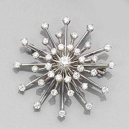 Bonhams : A diamond snowflake brooch/pendant