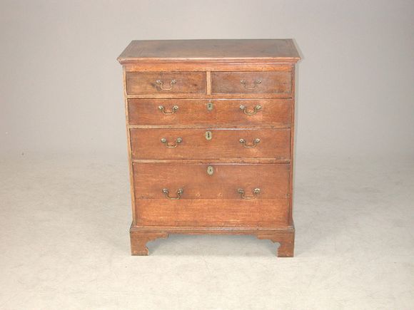 Bonhams : An early 19th century oak chest, with two short and three ...