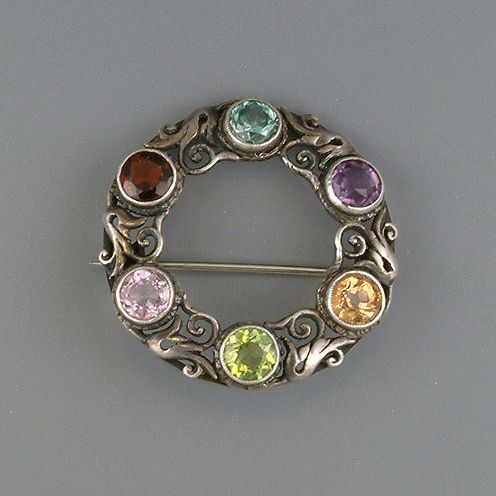 Bonhams : A multi gem-set brooch Sybil Dunlop
