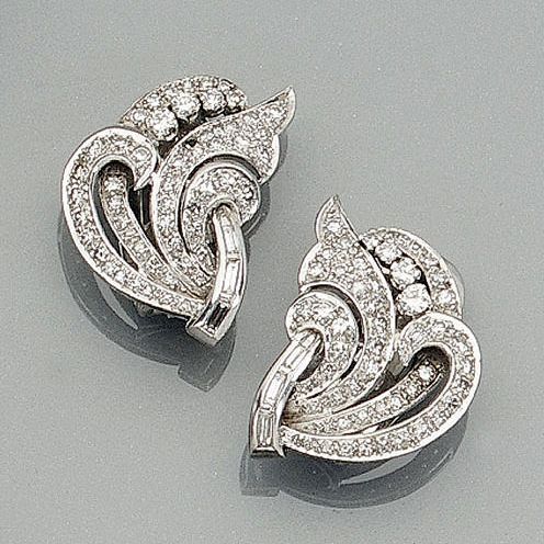 Bonhams : A pair of diamond scroll earclips