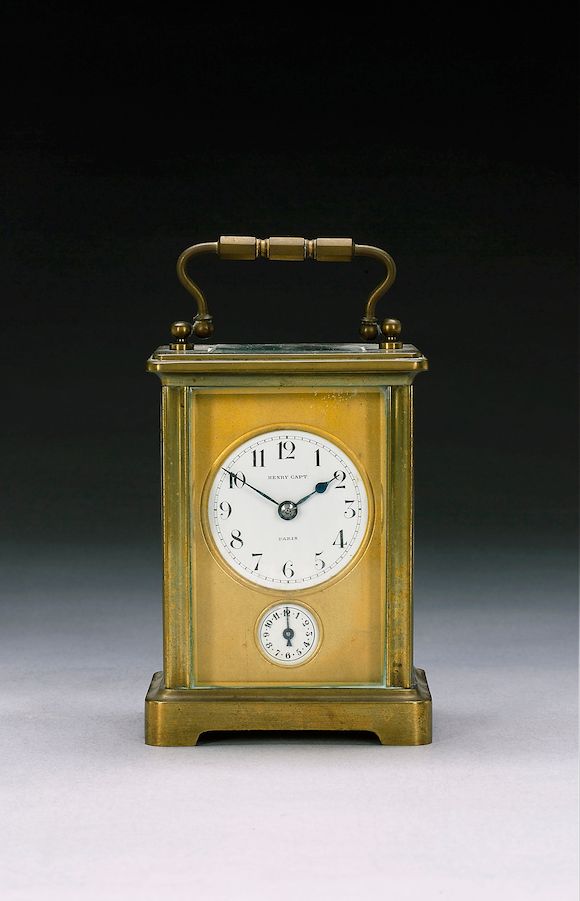 Bonhams : A French late 19th century lacquered brass carriage alarm clock Dial signed Henry Capt ...