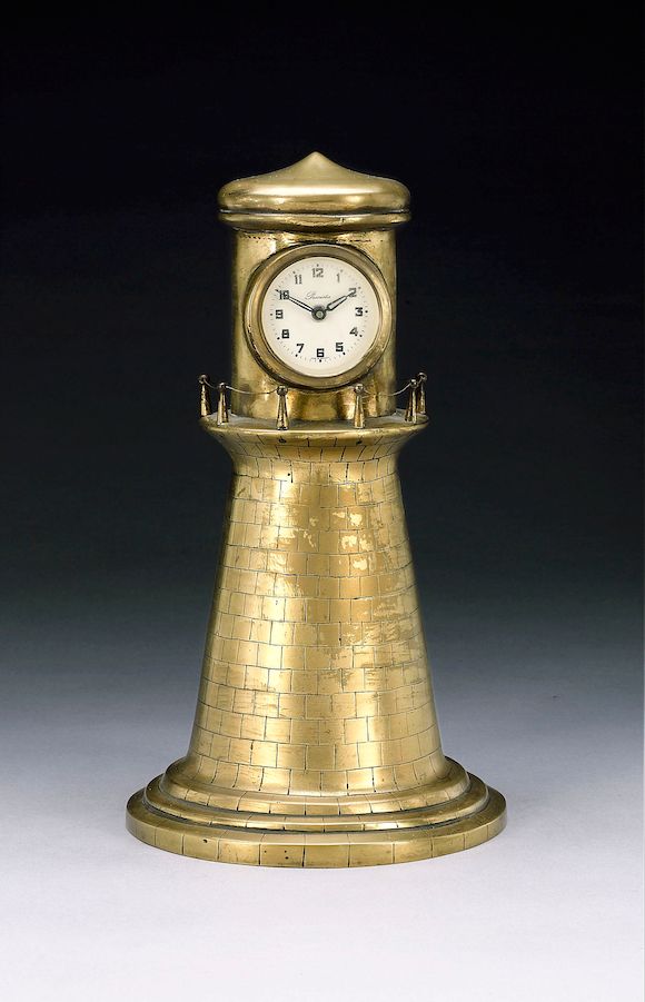 Bonhams : An early 20th Century brass lighthouse timepiece, the ...