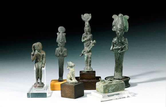 Bonhams : Mixed group of Egyptian bronzes- 2 Osiris, Isis and Horus ...