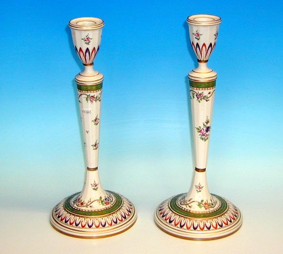 Bonhams : A pair of French porcelain candlesticks,