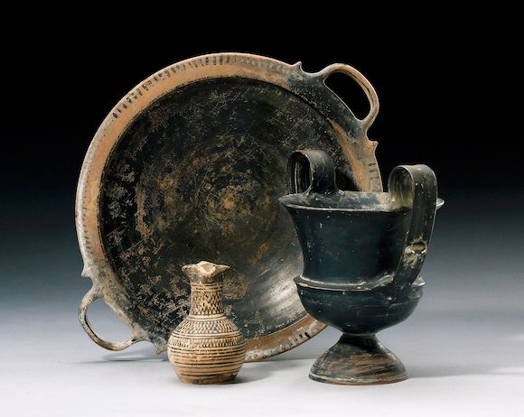 Bonhams : A Greek South Italian black-glazed plate, a black-glazed ...