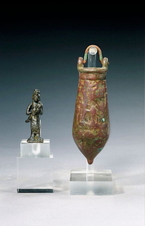 Bonhams : An Egyptian bronze situla and seated figure of Isis (2)