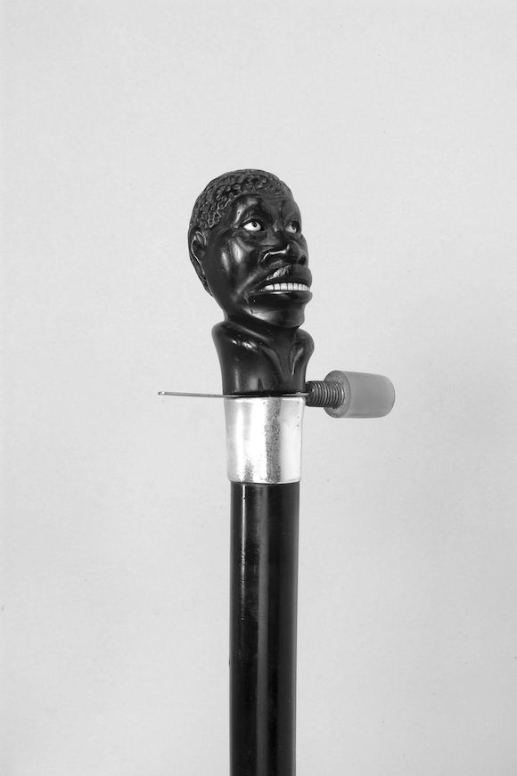 Bonhams : A late 19th century ebony mounted reluctant beheader gadget cane,