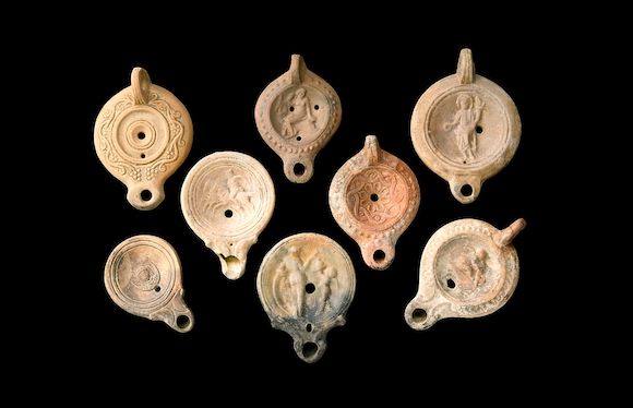 Bonhams : Fifteen moulded Roman oil lamps, Circa 1st-3rd Centuries A.D ...
