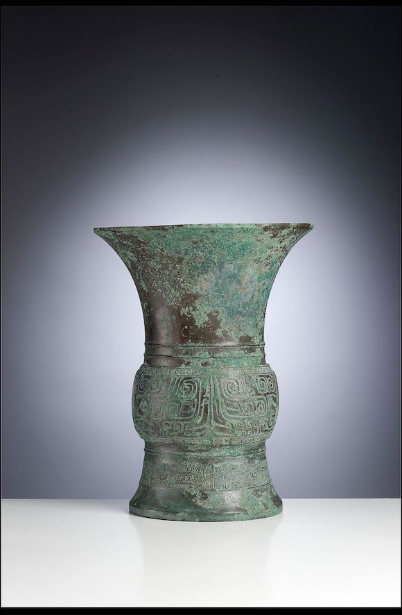 Bonhams : A fine inscribed archaic bronze wine vessel zun Early Western ...