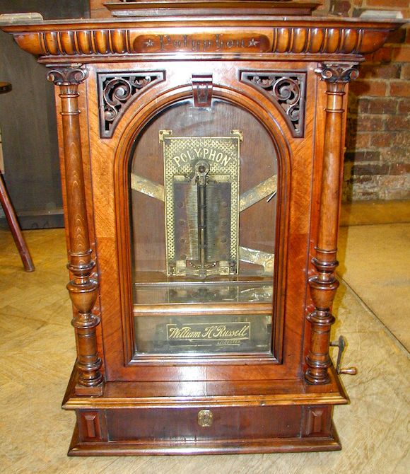 Bonhams : A Polyphon style 104 penny in the slot upright disc musical box,