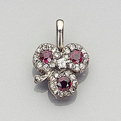 Bonhams : A diamond and ruby clover pendant