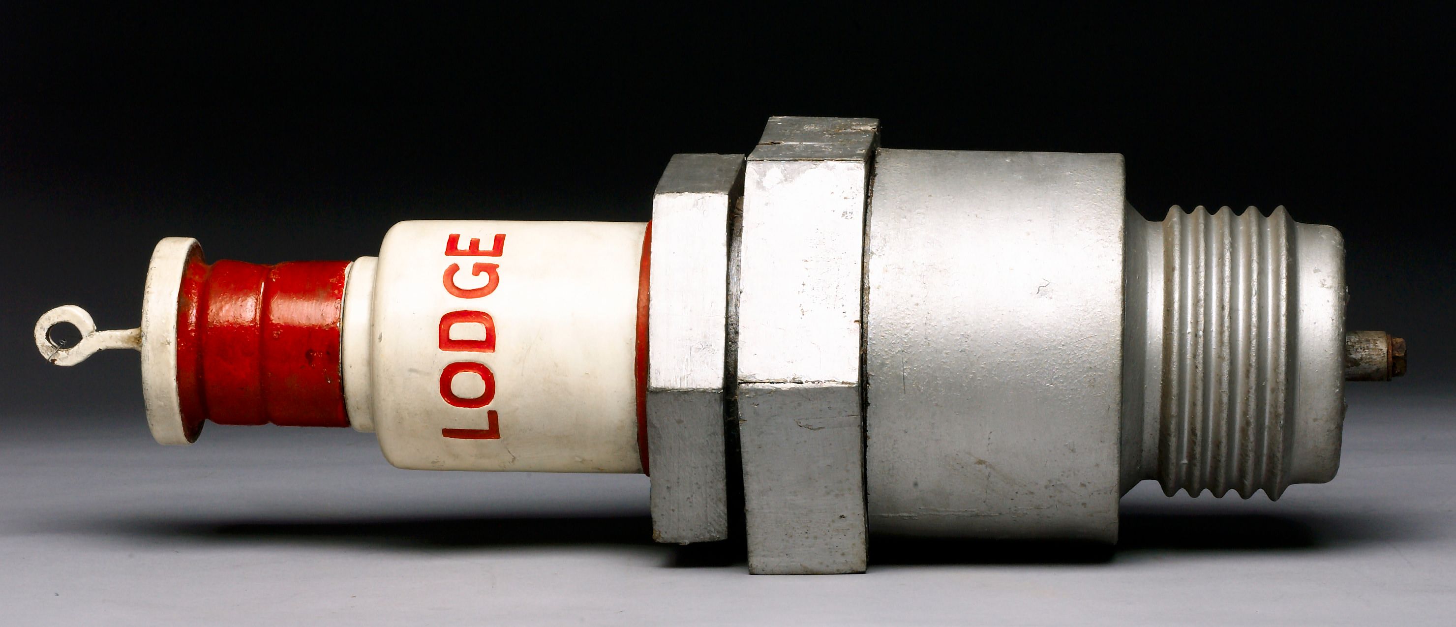 Bonhams Cars : A Lodge spark plug hanging sign,