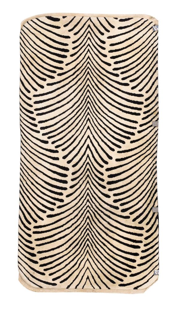Bonhams : A Gordon Russell design rug circa 1930, 176cm x 90cm