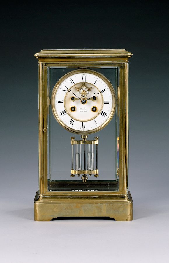 Bonhams : A late 19th century lacquered brass four glass mantel clock ...