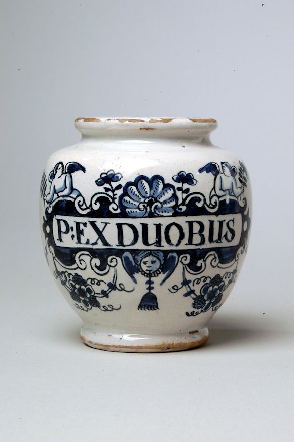 Bonhams : An English Delft blue and white pill jar,