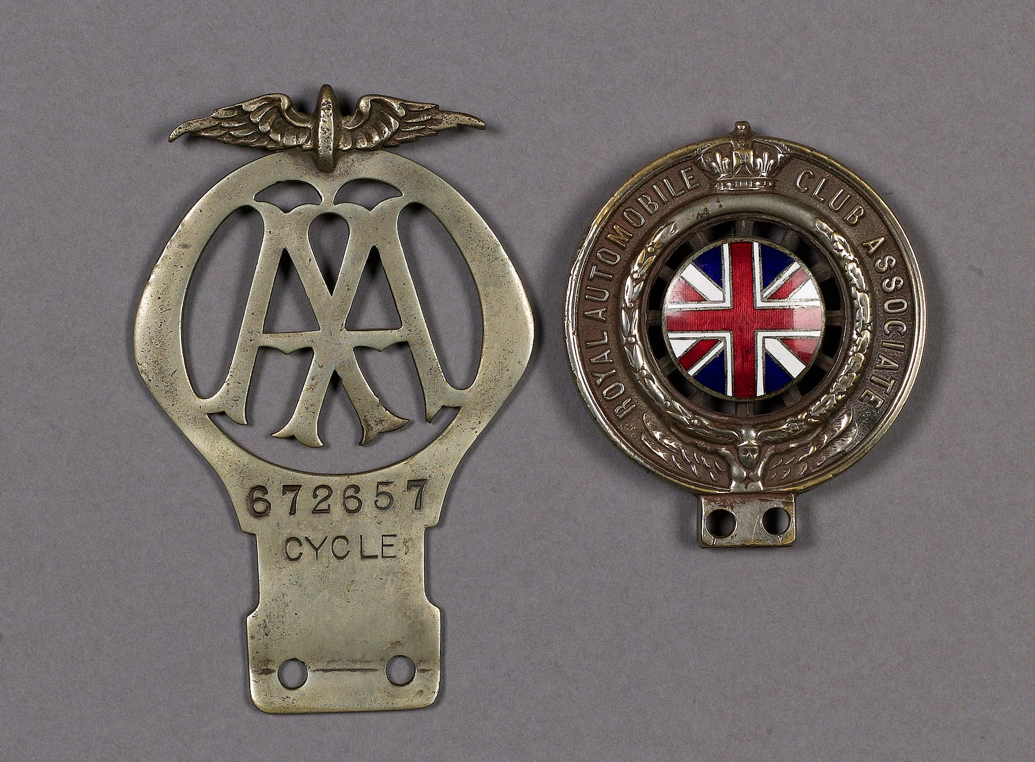 Bonhams Cars : An early solid nickel AA motorcycle badge,