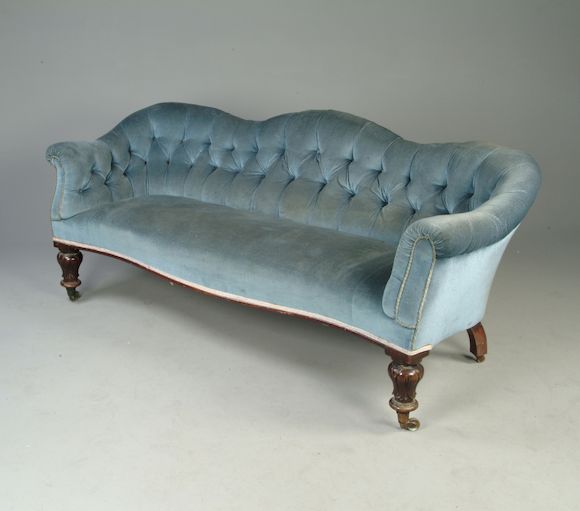 Bonhams : 19th century upholstered sofa raised on mahogany legs