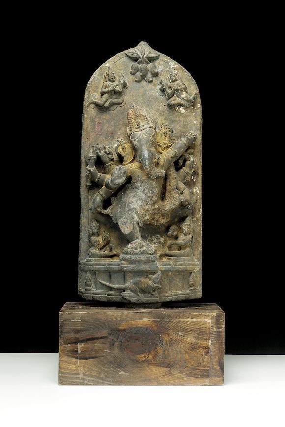 Bonhams : A black stone figure of an eight-armed Ganesha Eastern India ...