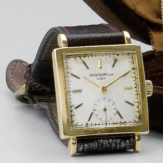Bonhams : Patek Philippe. An 18ct gold square wristwatch with ...