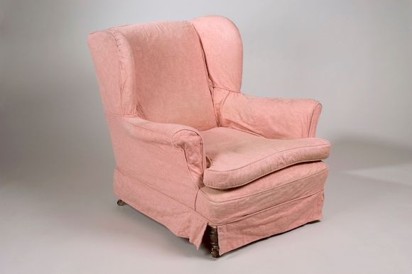Bonhams : A late Victorian deep seated wing and roll arm easy chair,