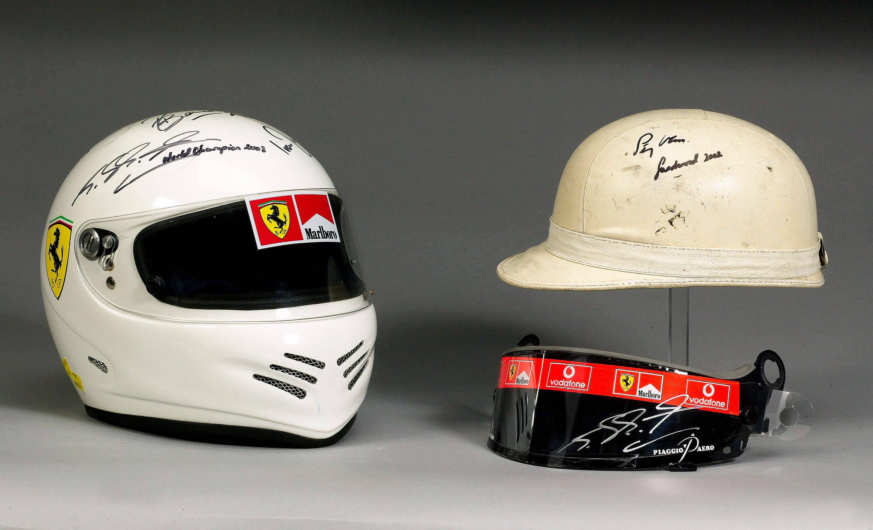 Bonhams Cars : A multiple signed Bieffe white Kevlar Predator F1 helmet,