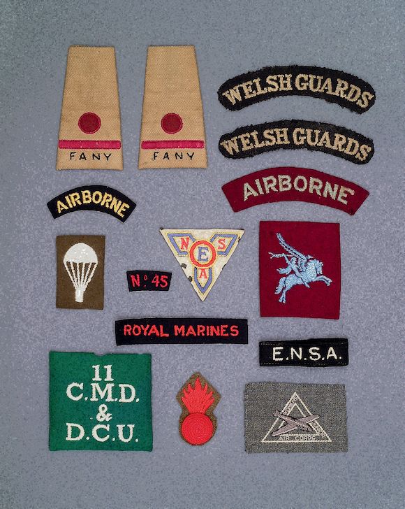 Bonhams : Cloth arm badges and shoulder titles