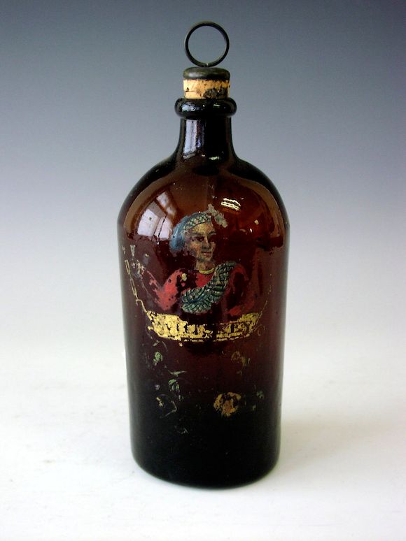Bonhams : An amber glass Whiskey Bottle and Stopper, early 19th Century,
