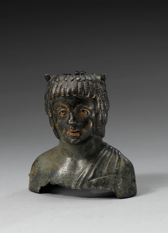 Bonhams : A Roman bronze balsamarium in the form of the bust of a Nubian