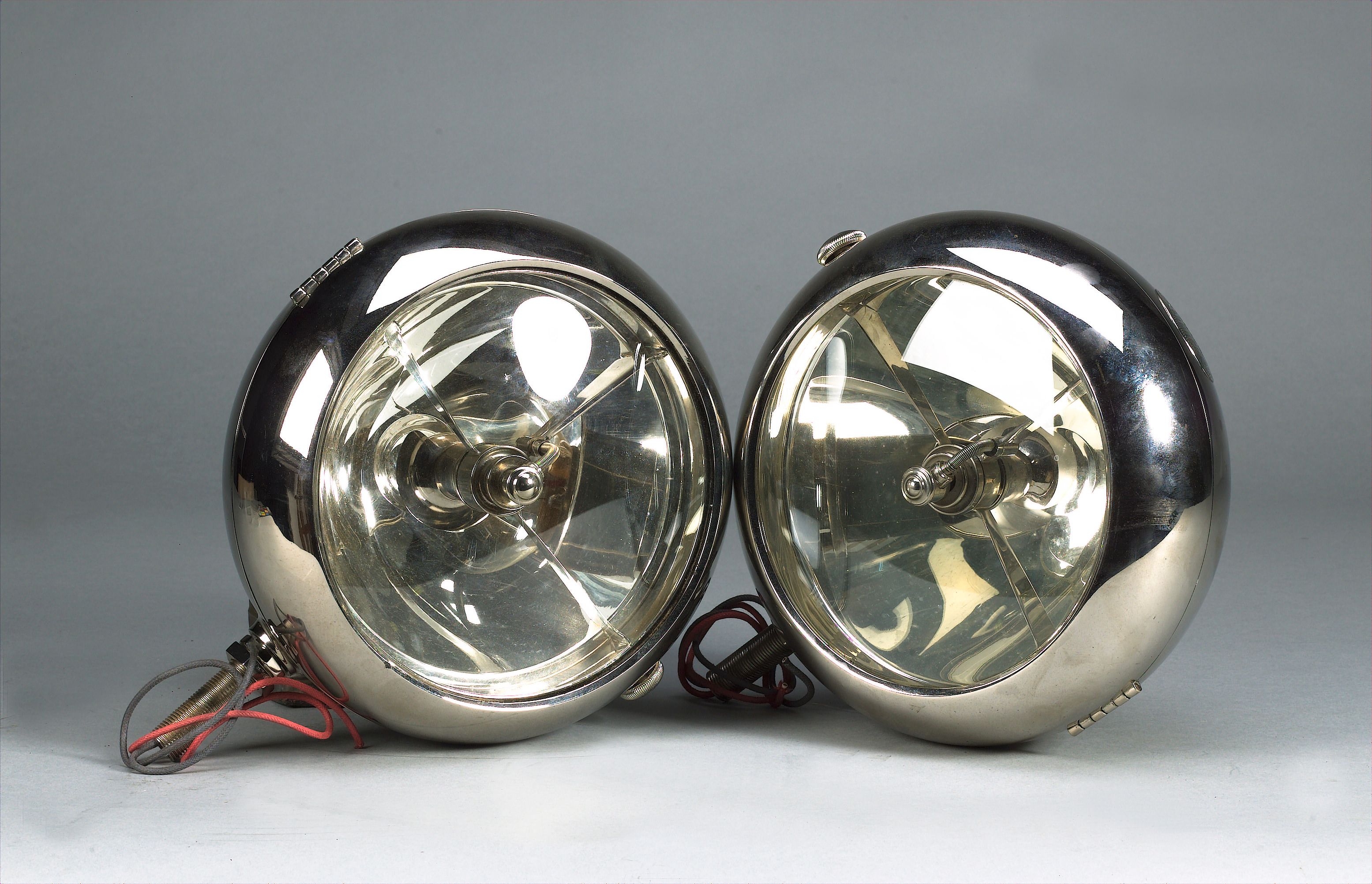 Bonhams Cars : A fine pair of Stephen Grebbel tri-bar headlamps,