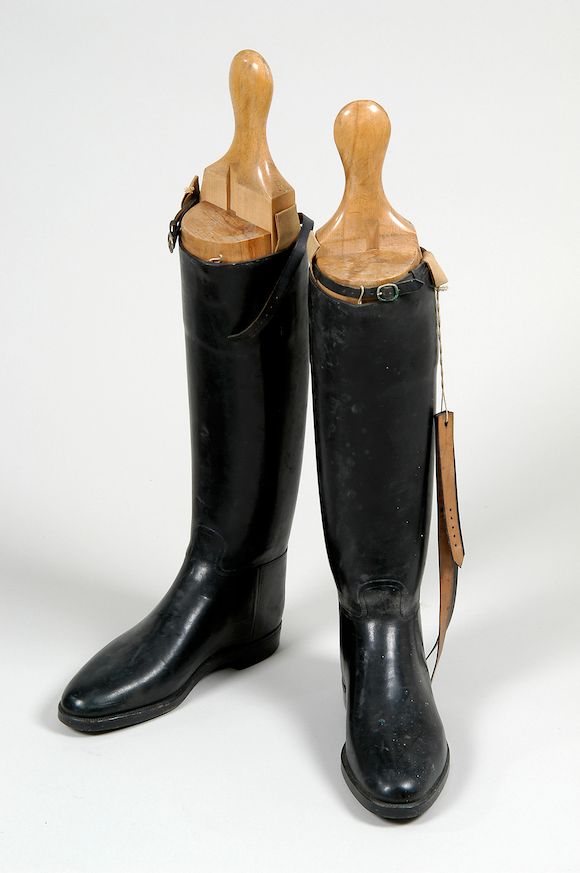 Bonhams : A pair of Flack and Smith black leather riding boots,