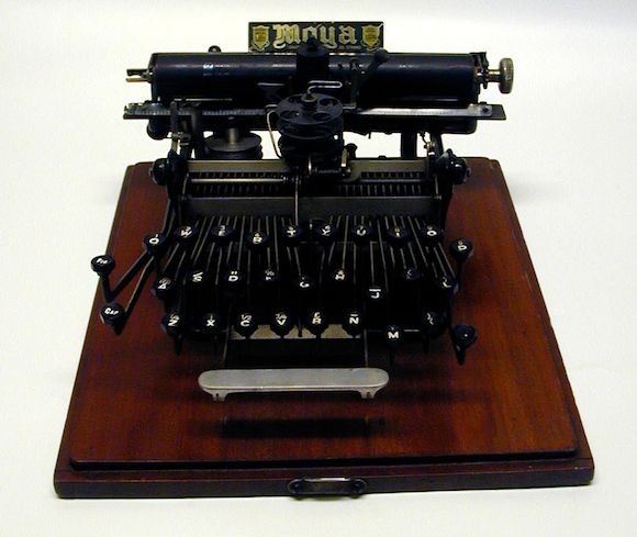 Bonhams : A Moya model 1 three row, type-sleeve typewriter.
