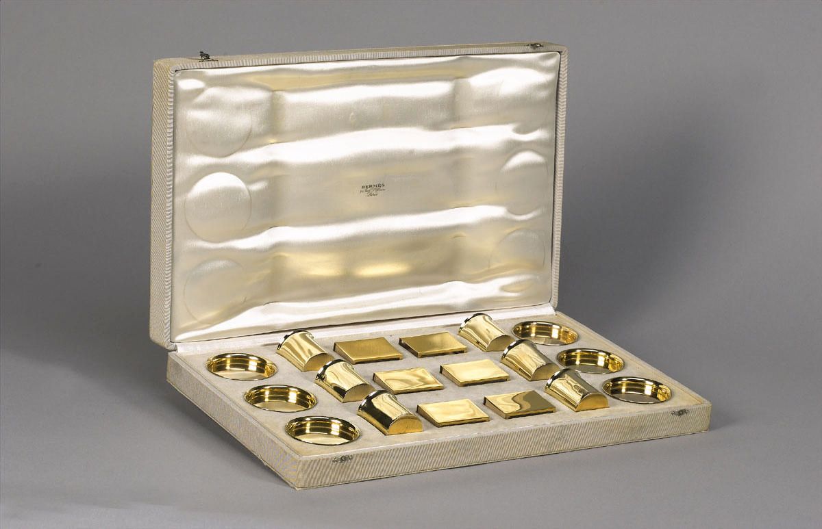 Bonhams Cars : A rare Hermès 18 piece set of vermeil sterling silver ...