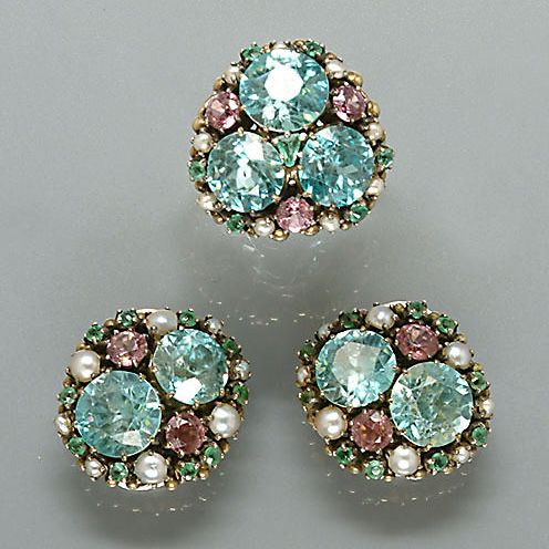 Bonhams : A multi-gem set cluster ring and earclip suite by Sybil Dunlop