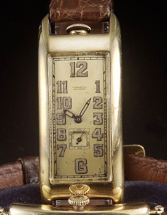 Bonhams : Movado. A fine and rare 18ct gold large curved rectangular ...