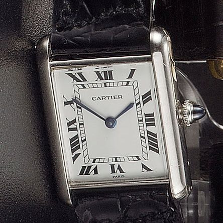Cartier. A gents 18ct gold curved rectangular calendar wristwatch ...
