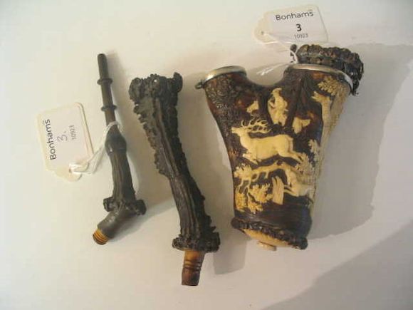 Bonhams : A 19th Century stag antler and relief carved Meerschaum Pipe,