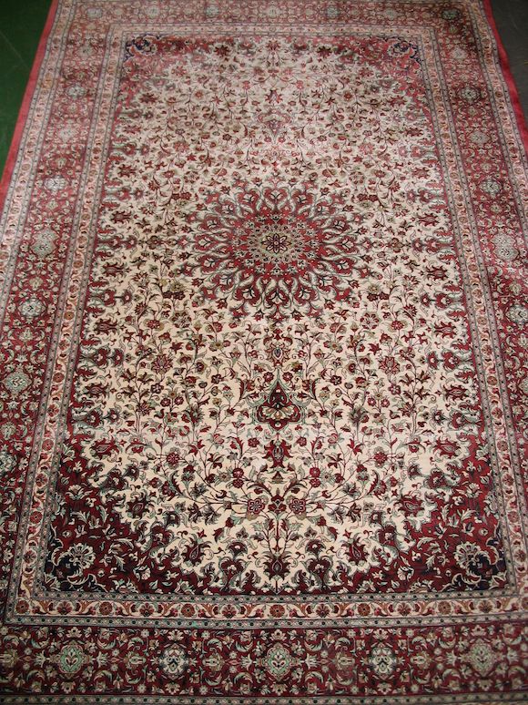 Bonhams : A Ghom silk rug Central Persia, 201cm x 130cm signed