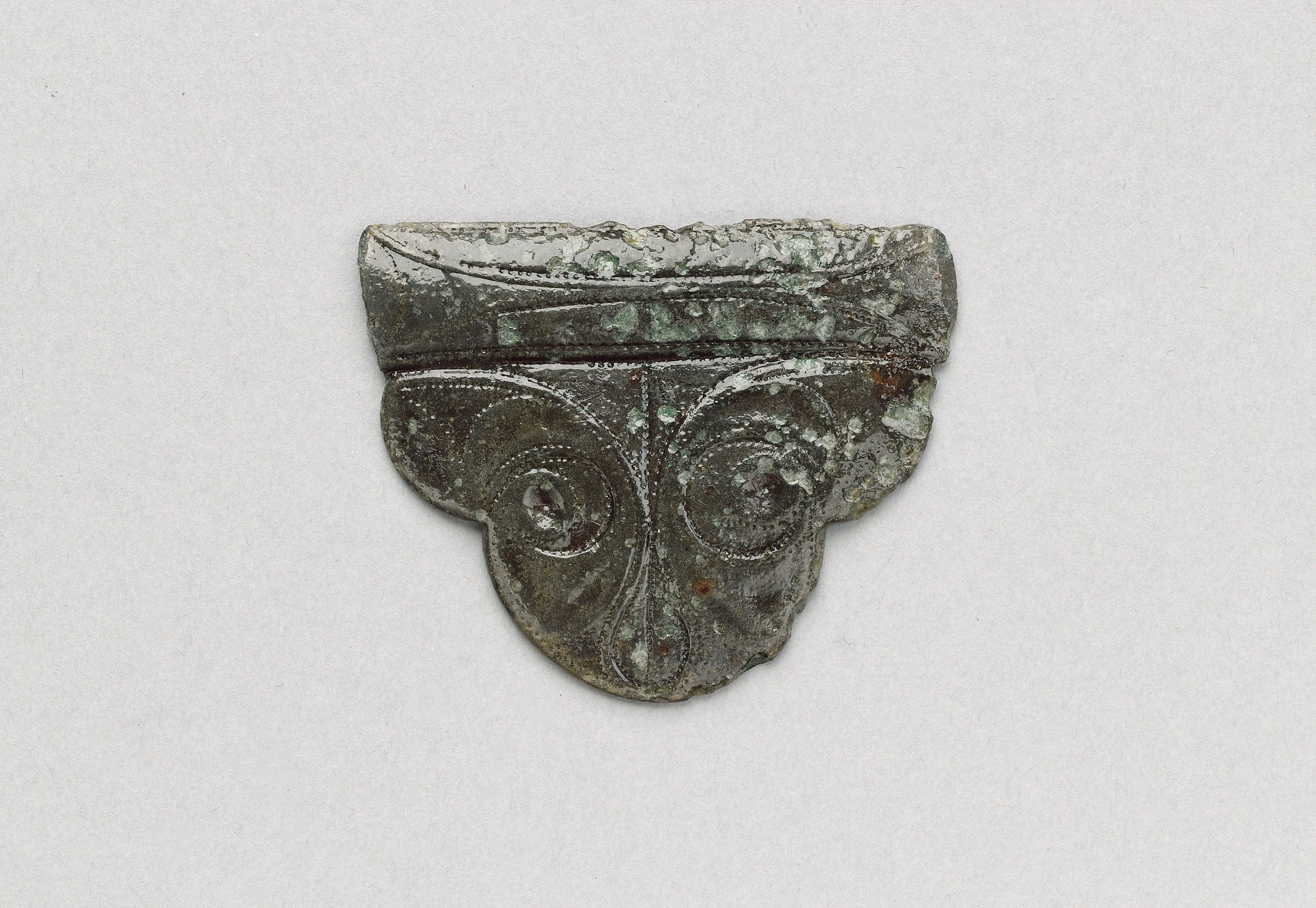 A Celtic bronze sword scabbard mount - auctions & price archive