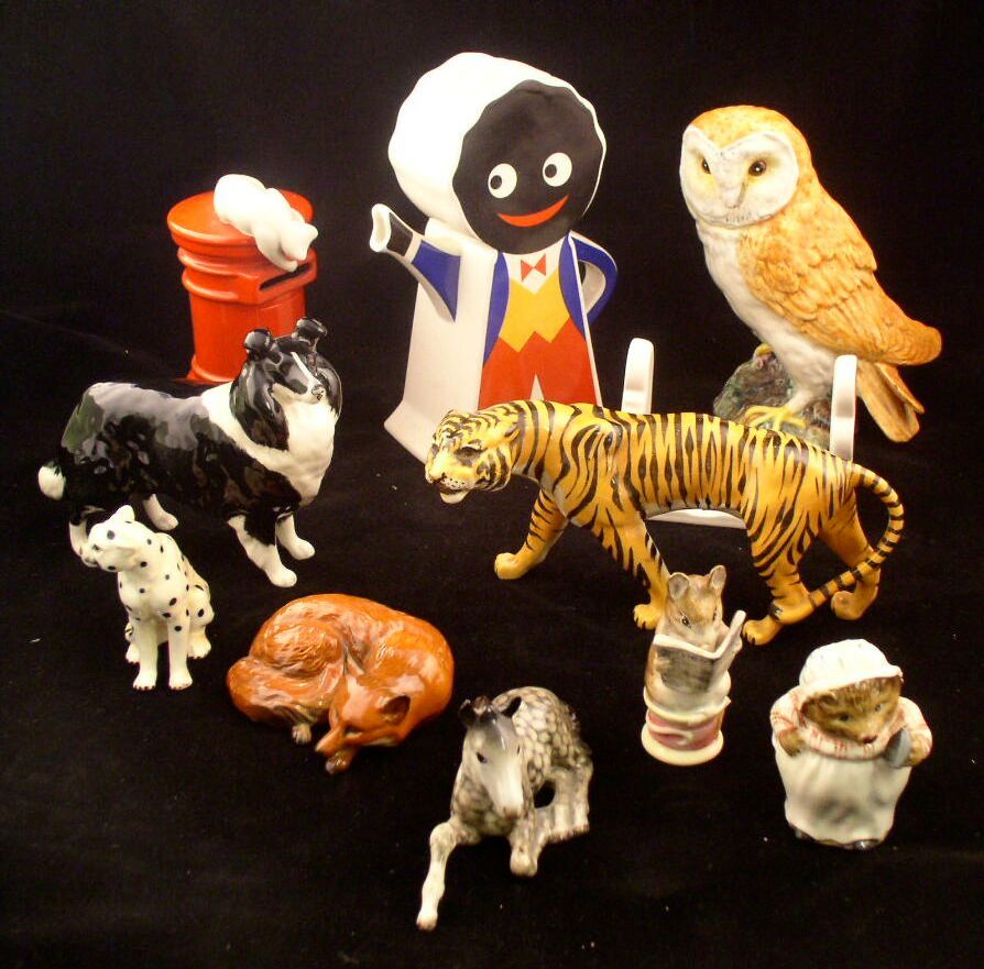 Two Beswick animal figures - a Rottweiler model no 3056 and Fox ...