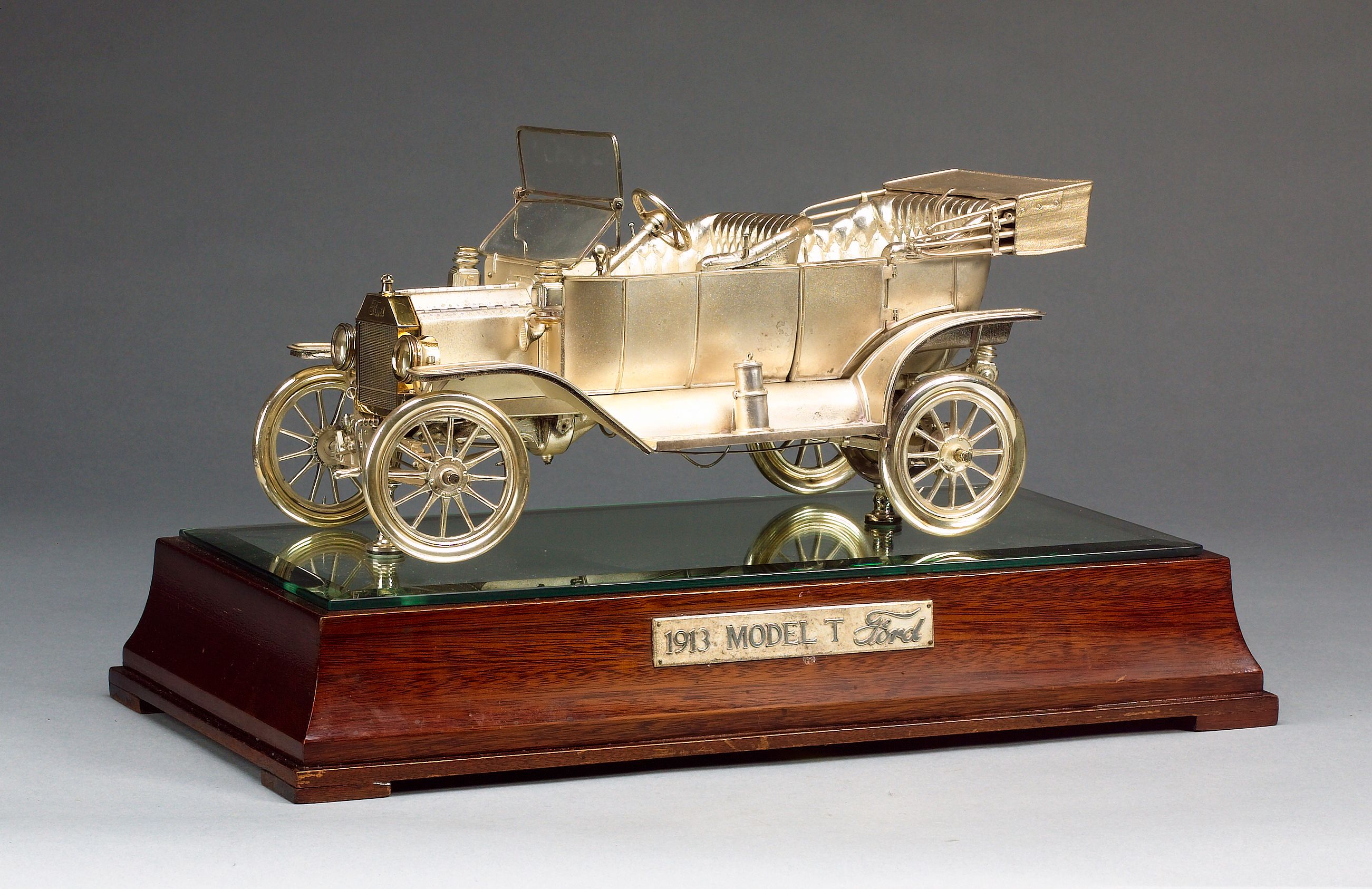 Bonhams Cars : A fine Sterling silver Model 'T' Ford by Garrard, 1979,