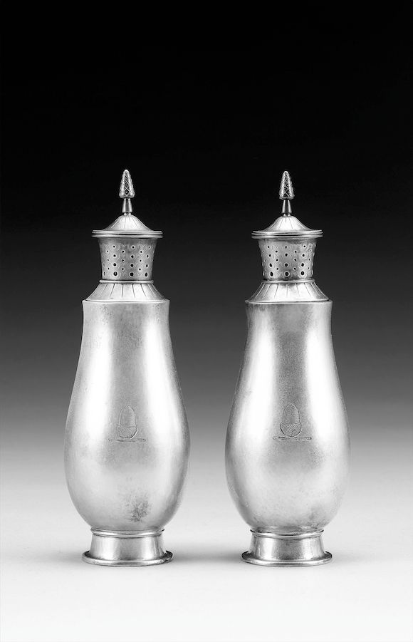 Bonhams : ERIC CLEMENTS : A pair of silver casters, by Wakely & Wheeler ...