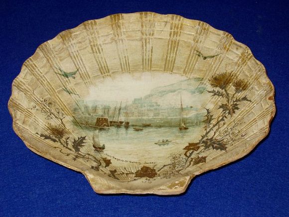 Bonhams : A set of three Victorian papier mache scallop shells,