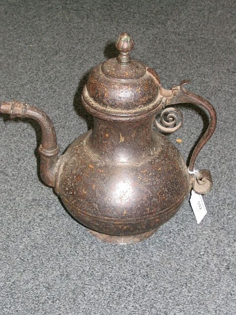 Bonhams : A koftgari work gold inlaid steel Ewer Deccan, 16th Century