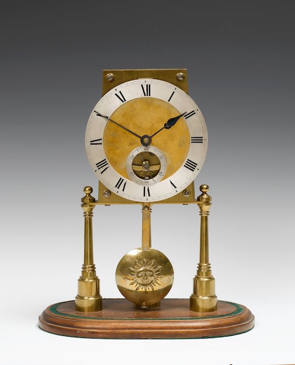 Bonhams : A rare 19th century lacquered brass table regulator with ...