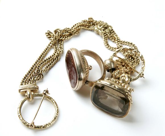 Bonhams : Two gold fobs and a gold fob chain,