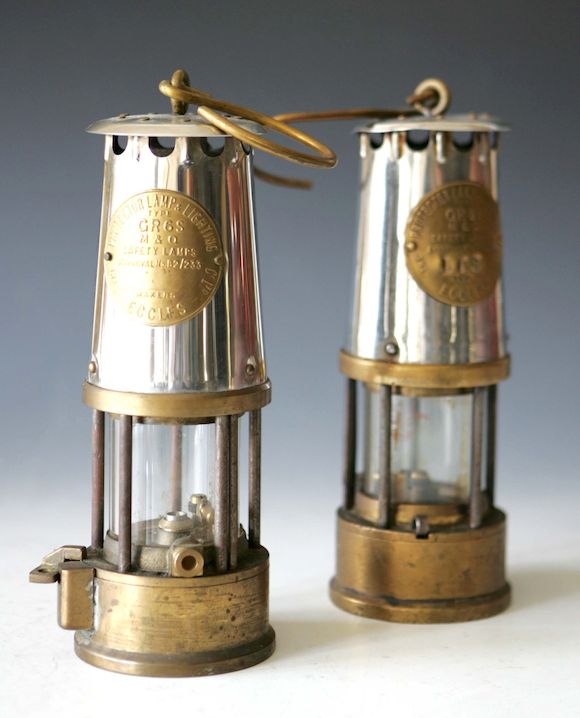 Bonhams : Two similar Miners Lamps,